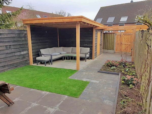 Tuin overkapping en schuur bij tuinaanleg in Houten